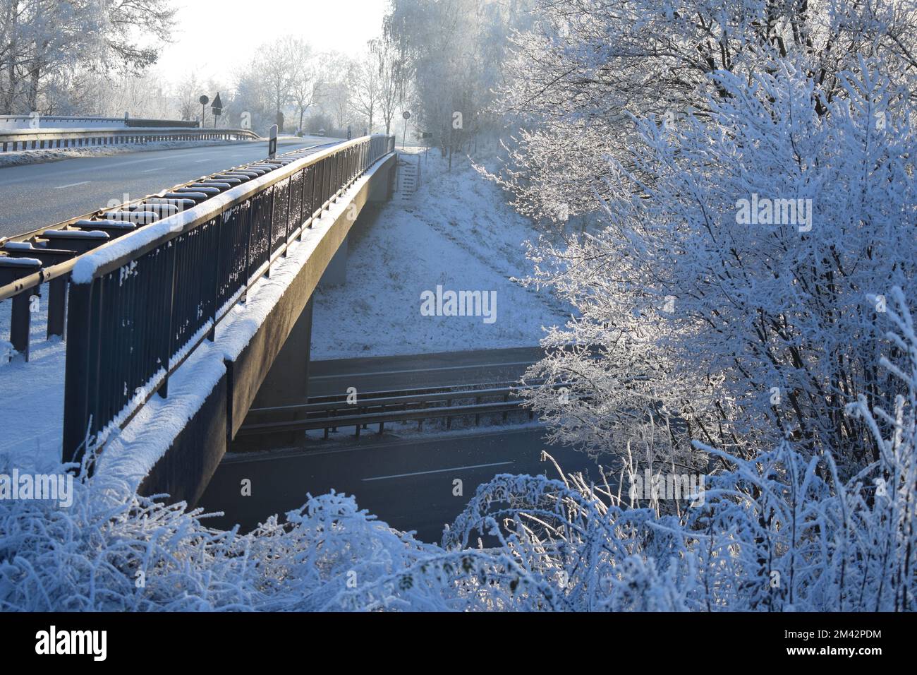 bridge across the Autobahn in winter with snow Stock Photo - Alamy