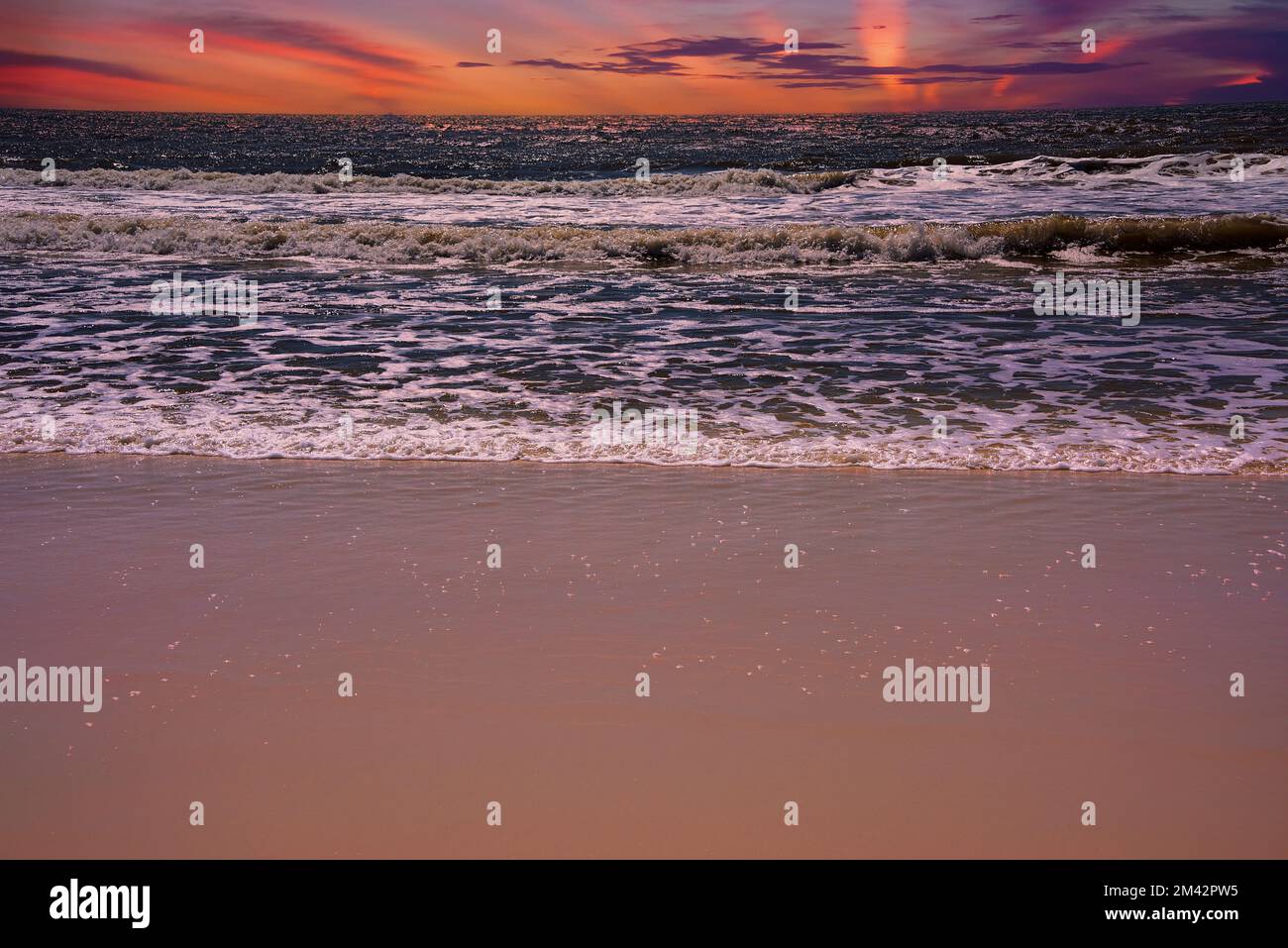 Evening magenta sky over the Gulf of Mexico on Destin Beach, Florida ...
