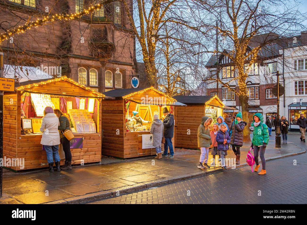 People shopping at Christmas street market in the Cheshire city of ...