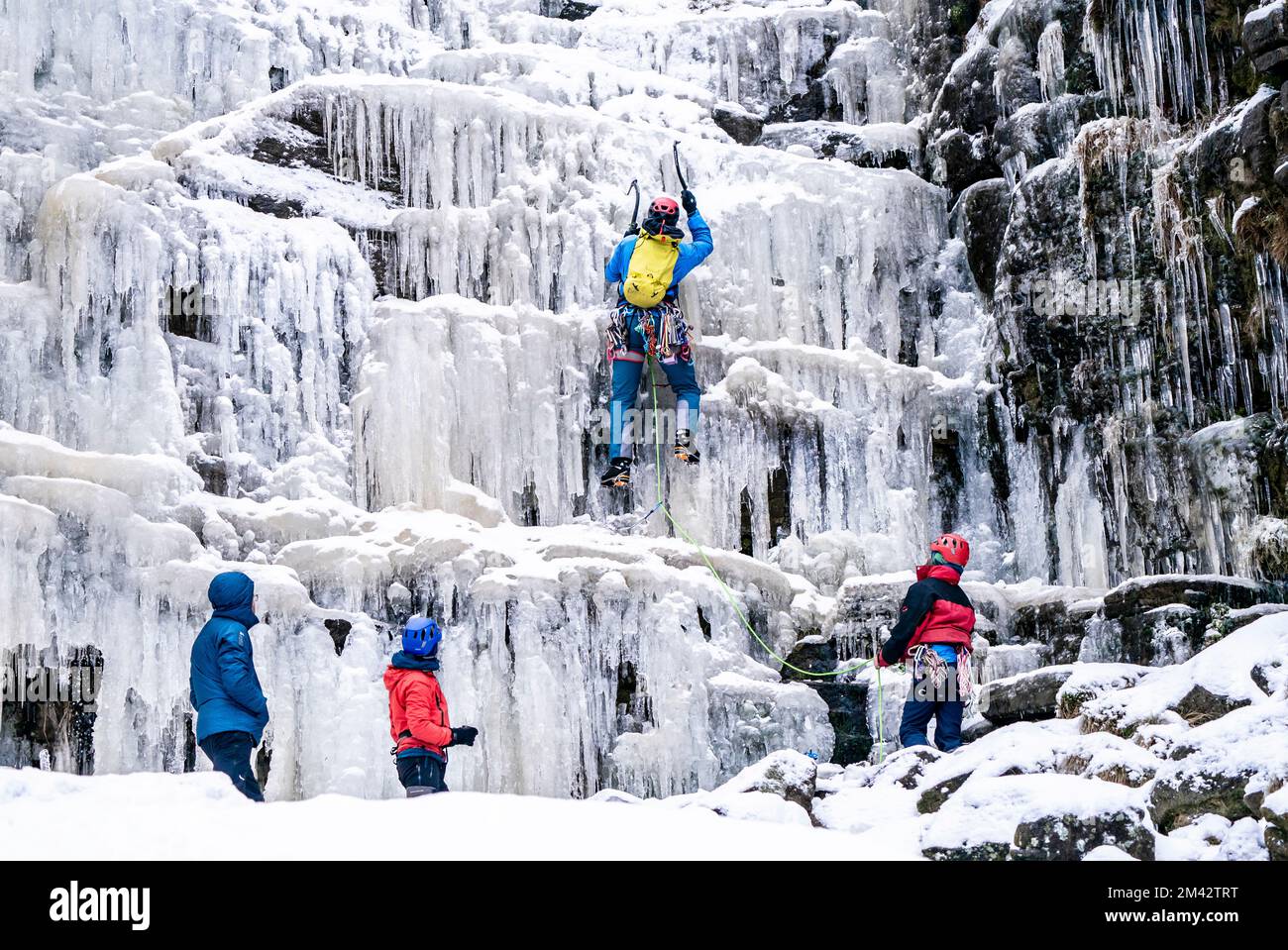 People ice climbing on the frozen Kinder Downfall, High Peak in ...