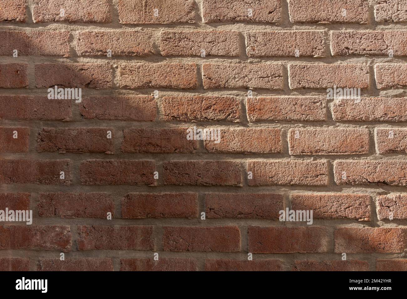 Diagonal sun shadow on old brick wall texture Stock Photo - Alamy