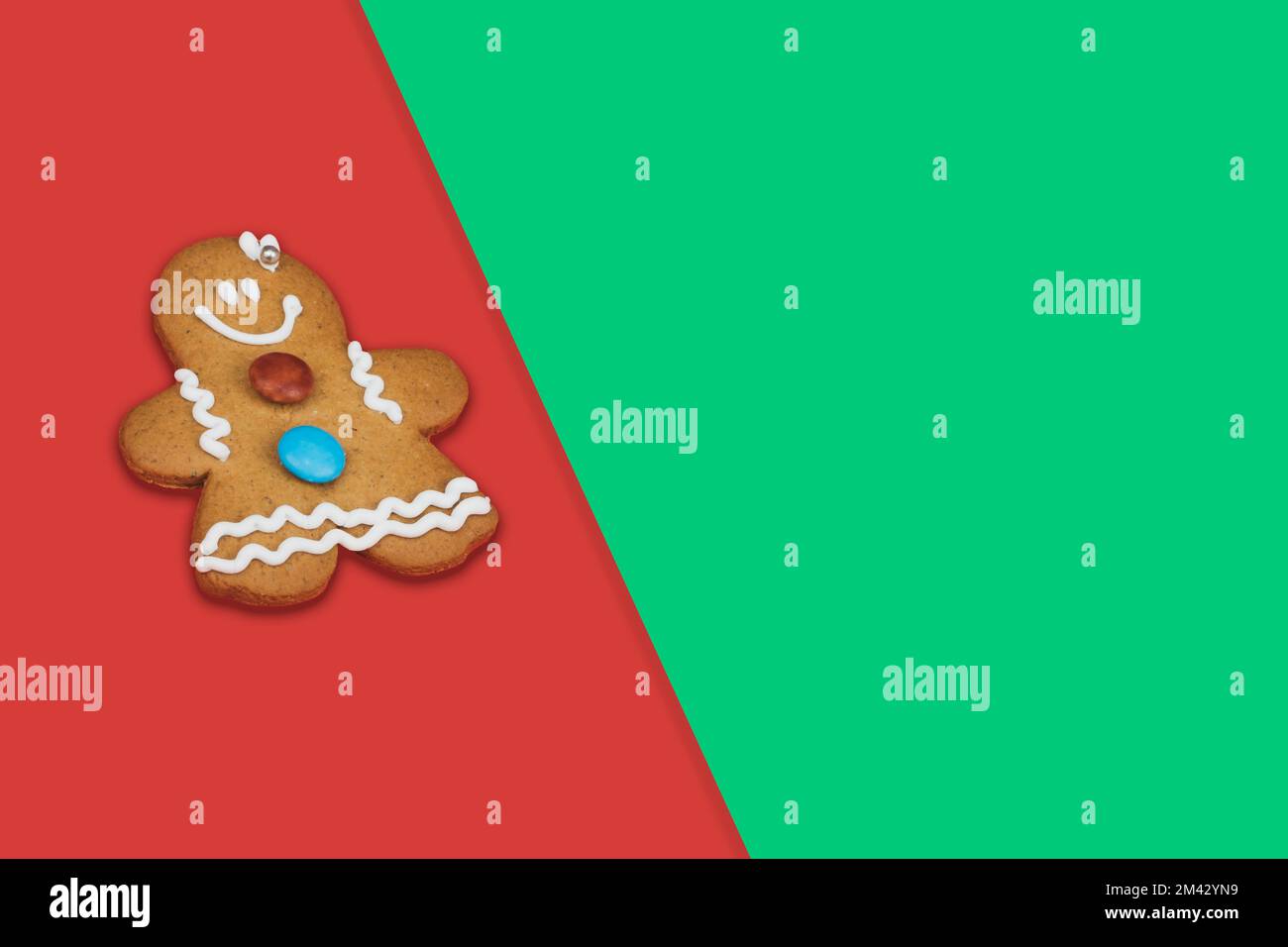 christmas cookie man, gingerbread man cookie, red and green background ...