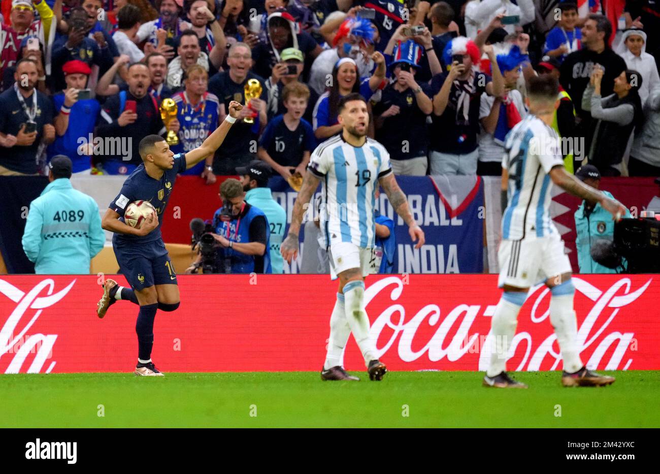 France's Kylian Mbappe (left) celebrates after scoring their side's ...