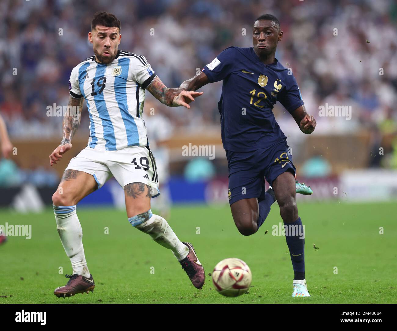 Doha, Qatar, 18th December 2022. Nicolas Otamendi of Argentina tussles ...