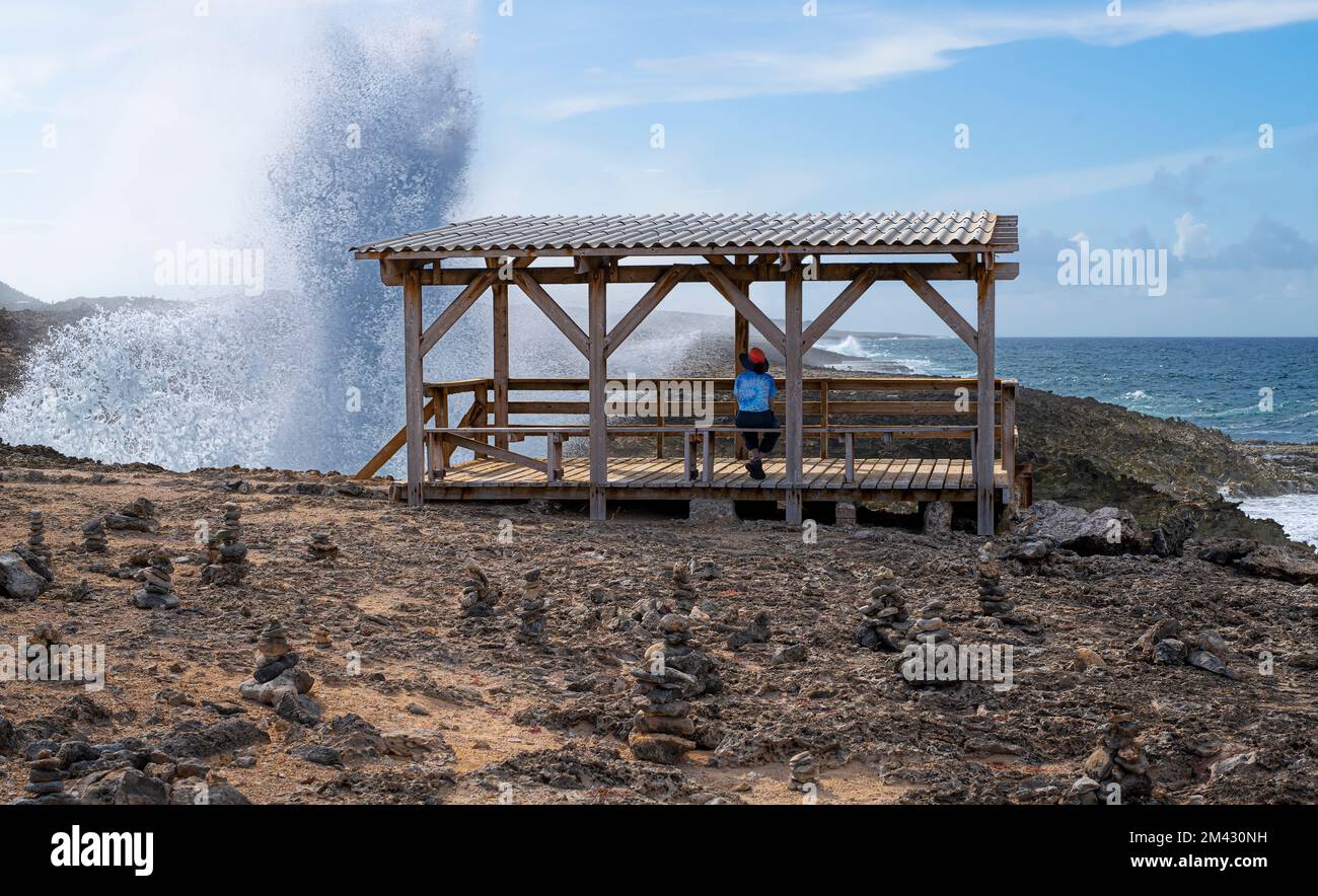 Woman Looking at Boka Pistol in Shete Boka Park, Curaçao, Netherlands ...