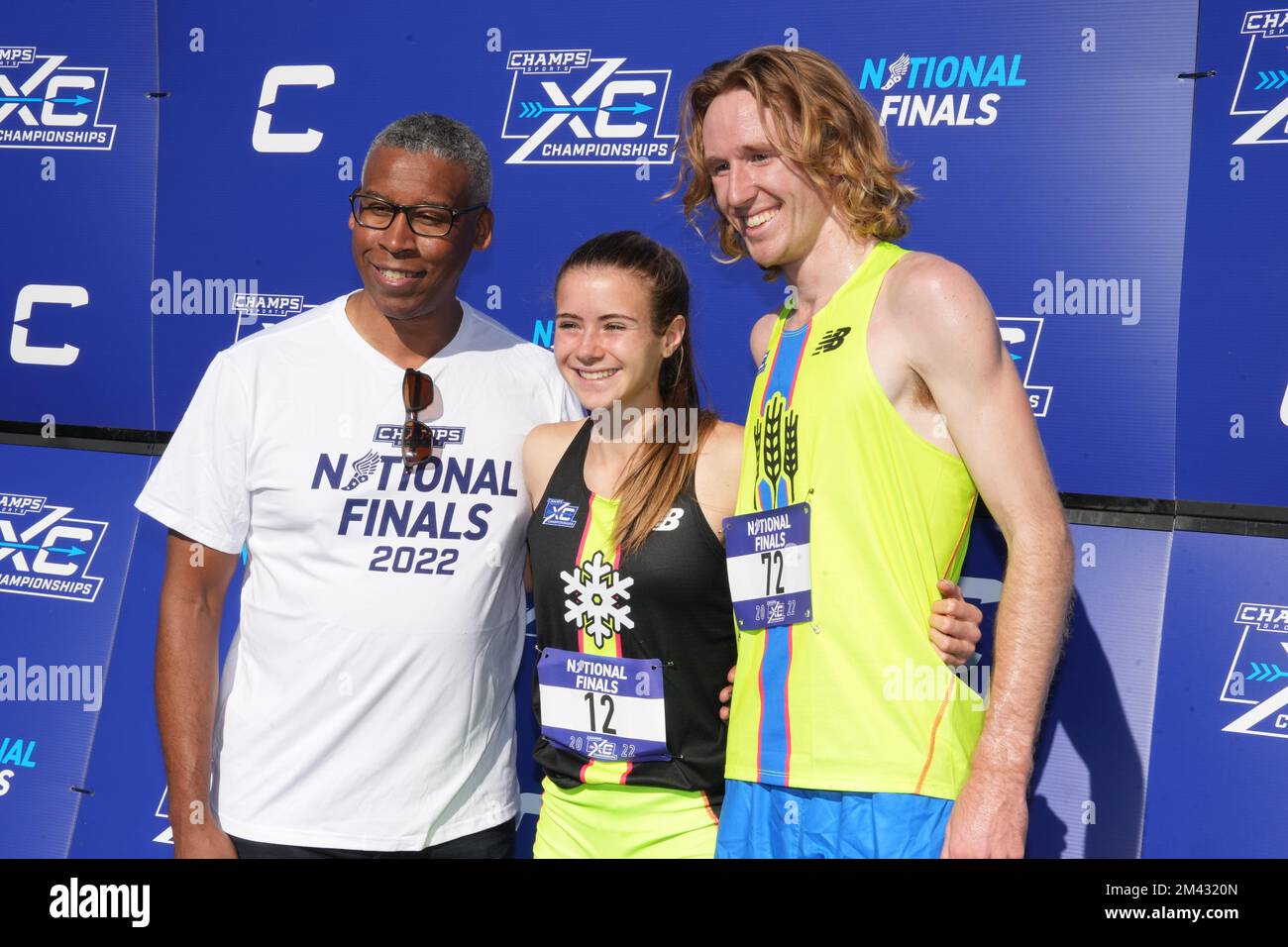 Girls winner Karrie Baloga (left) and boys winner Kole Mathison pose ...