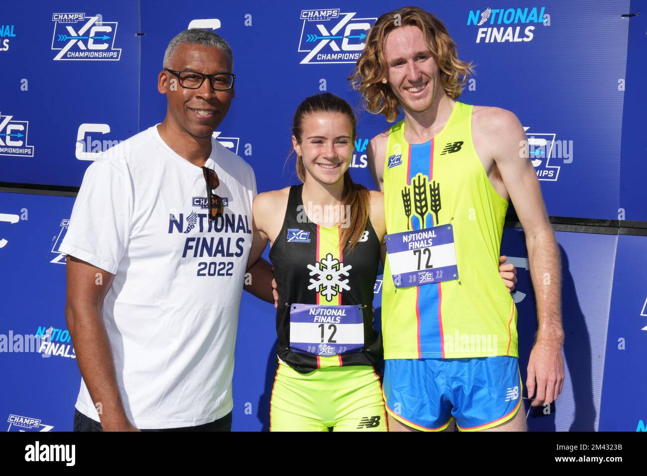 Girls winner Karrie Baloga (left) and boys winner Kole Mathison pose ...
