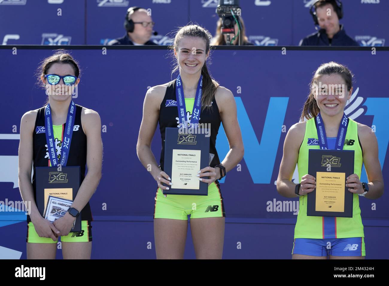 Girls winner Karrie Baloga (center) poses with runner-up Elle Shea ...