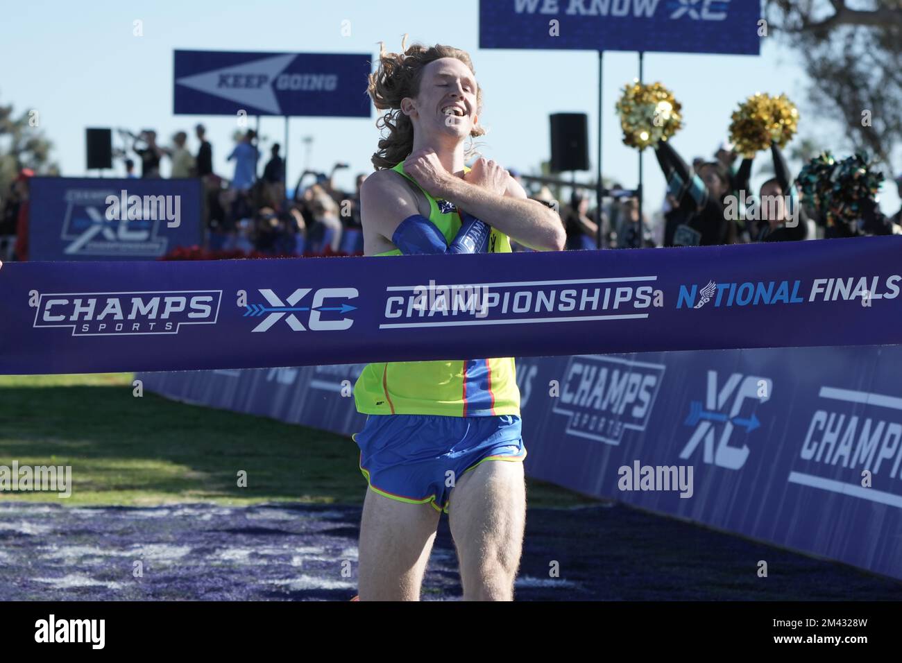 Kole Mathison celebrates after wining the boys race in 14:46.6 at the ...