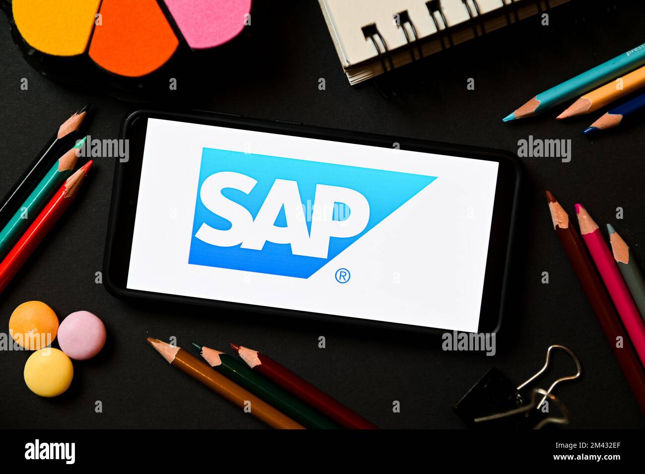 In this photo illustration a SAP logo seen displayed on a smartphone ...