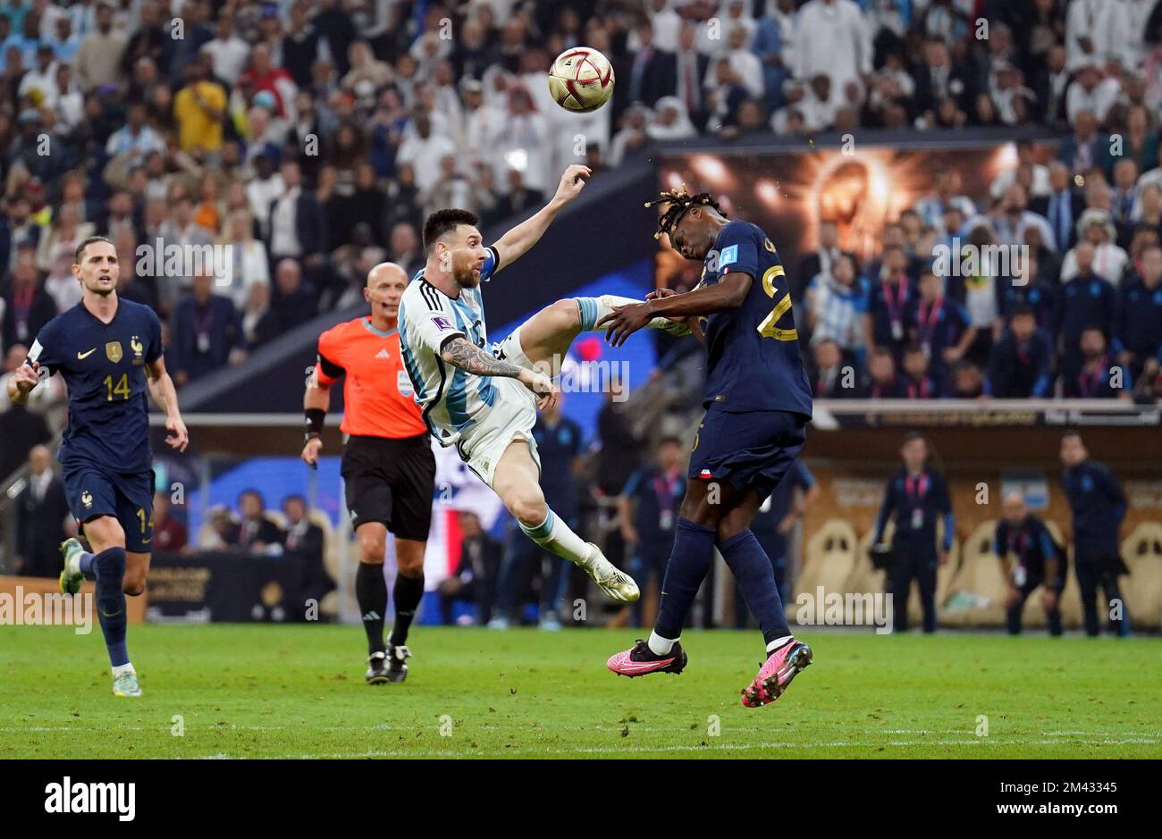 Argentina's Lionel Messi and France's Eduardo Camavinga (right) battle ...
