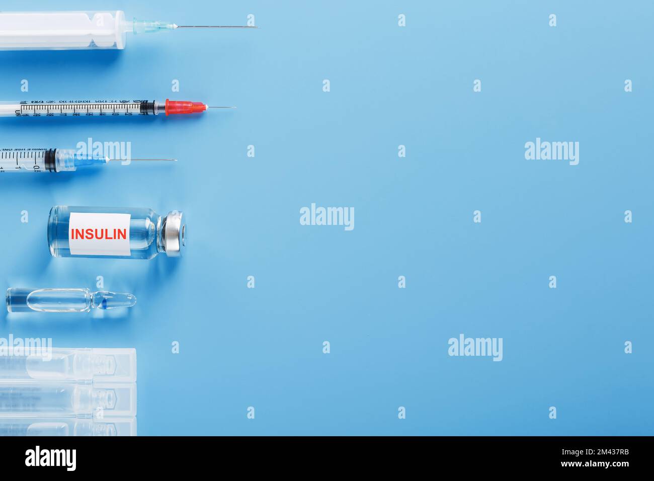 Ampoule bottle with insulin, needles and syringes for medical ...