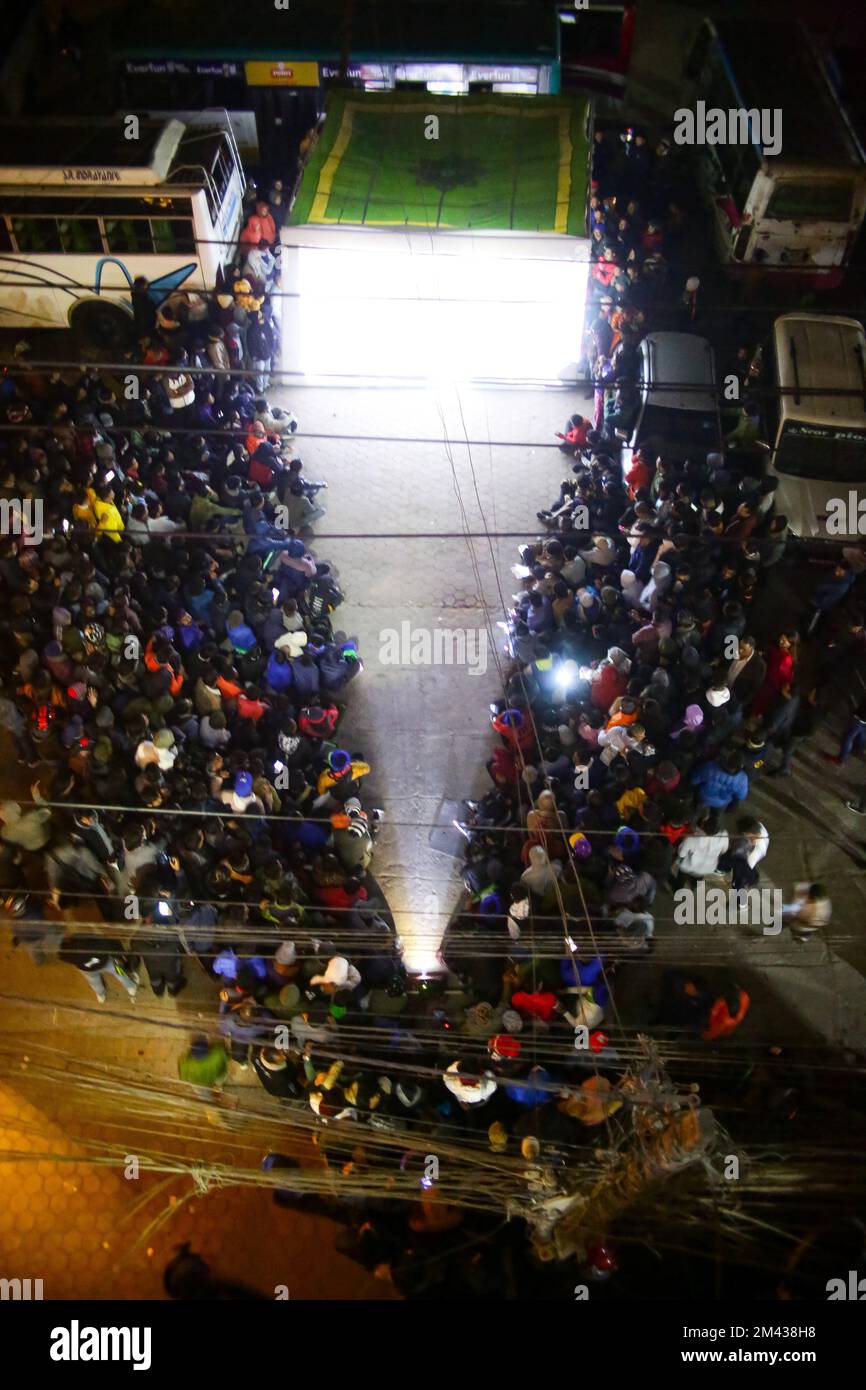 Nepal. 18th Dec, 2022. Nepali football fans watch the final match of ...