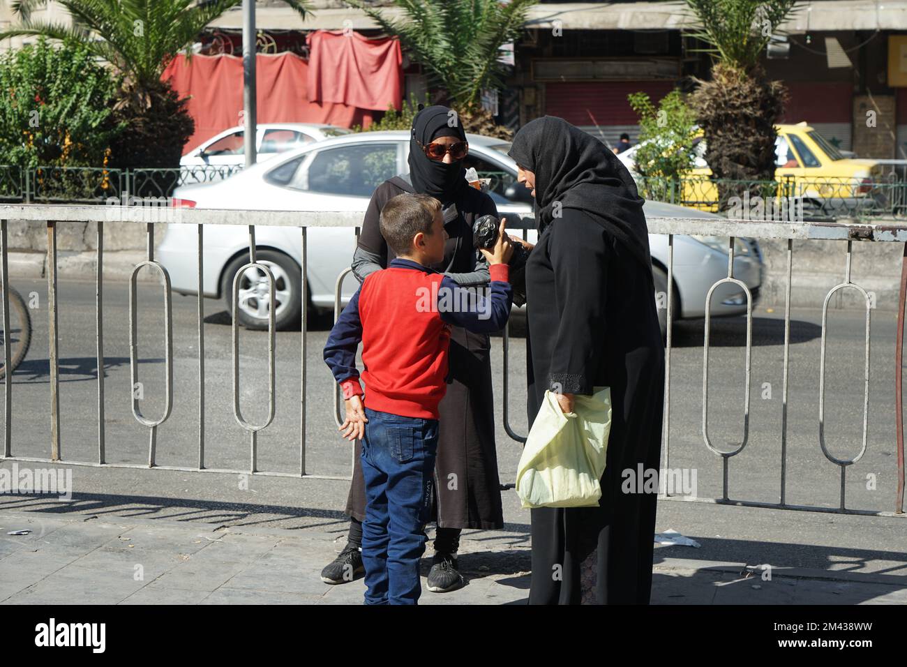 Damascus, Syria, little boy arguing with his grand mam Stock Photo - Alamy