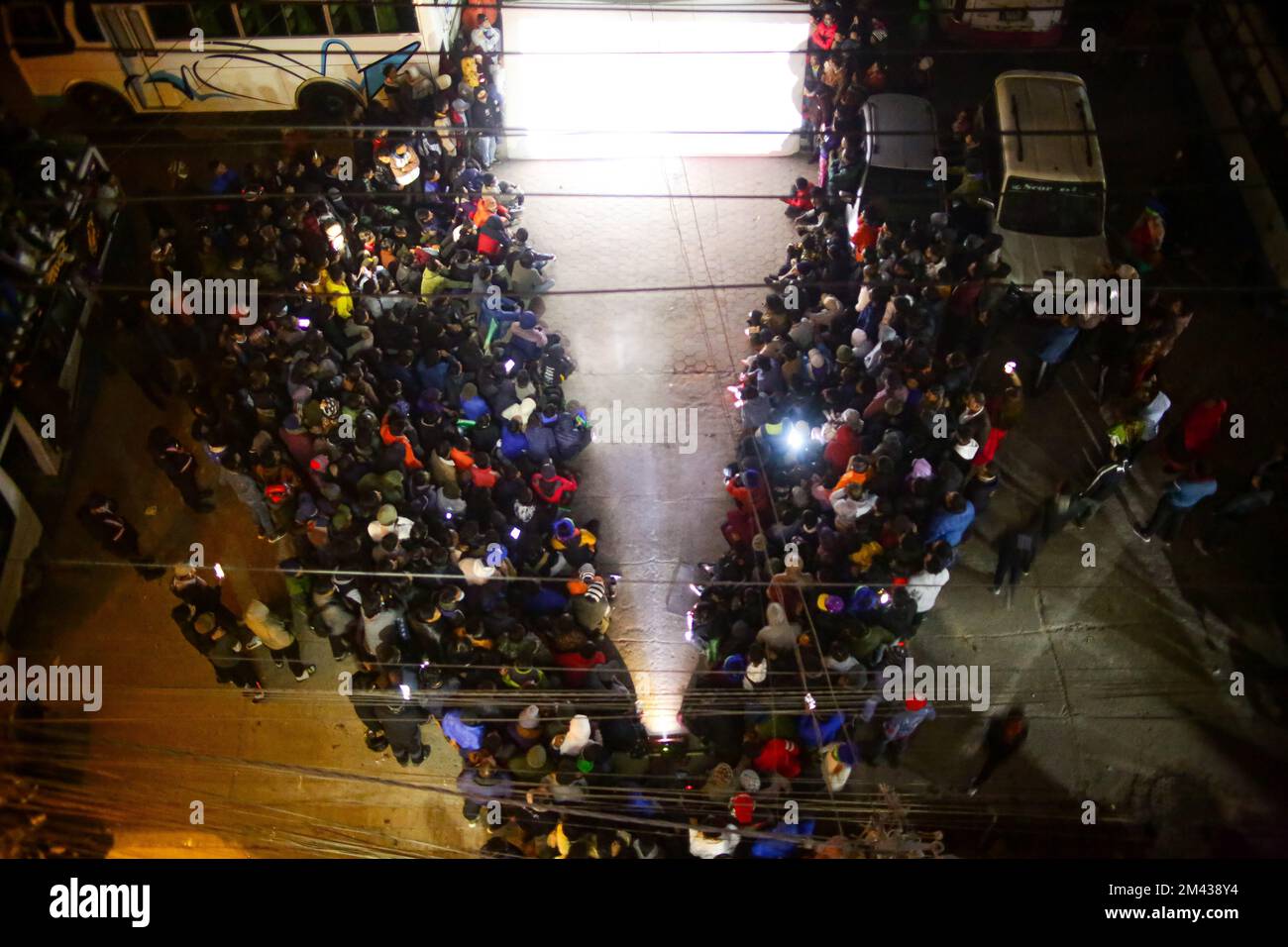Nepal. 18th Dec, 2022. Nepali football fans watch the final match of ...