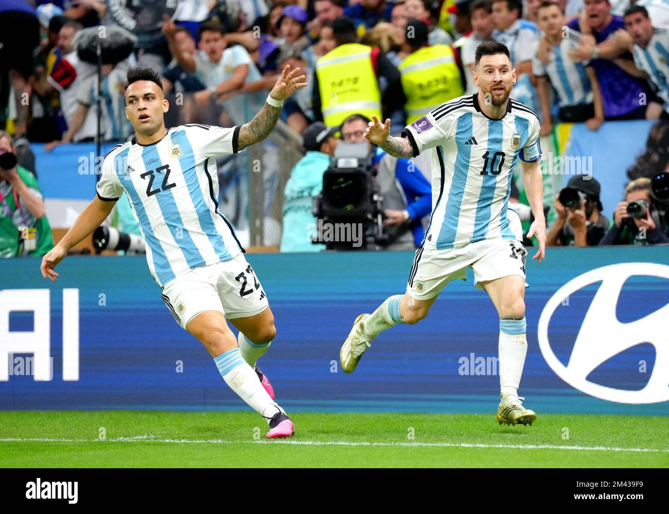 Argentina's Lionel Messi (right) celebrates scoring their side's third ...