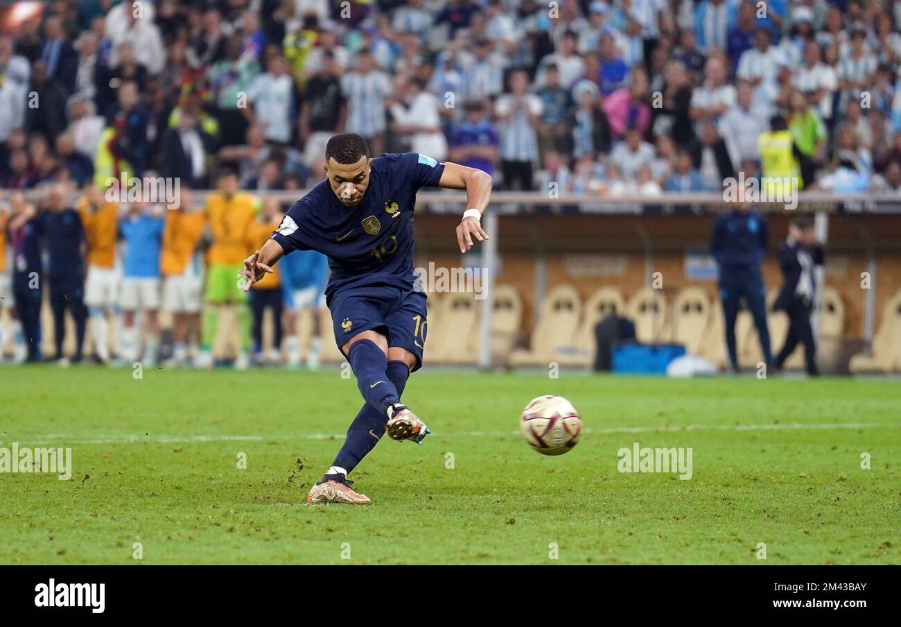 France's Kylian Mbappe scores the opening penalty during the shoot out ...
