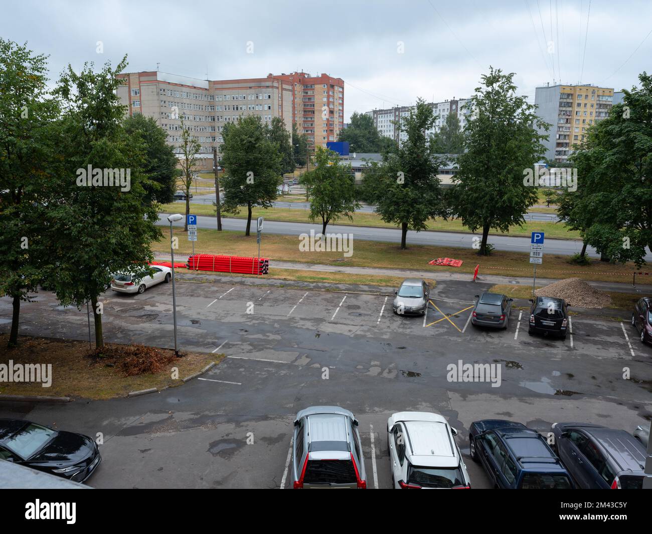 View from the window to the parking lot near the residential building ...