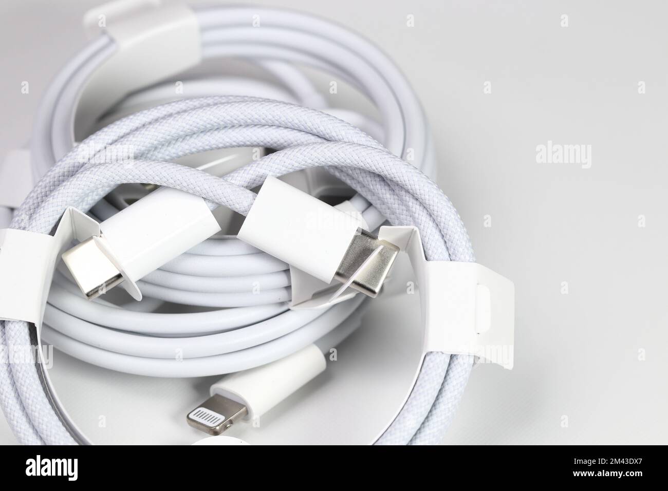 New white USB type charger cable, compatible for many devices, wrapped ...