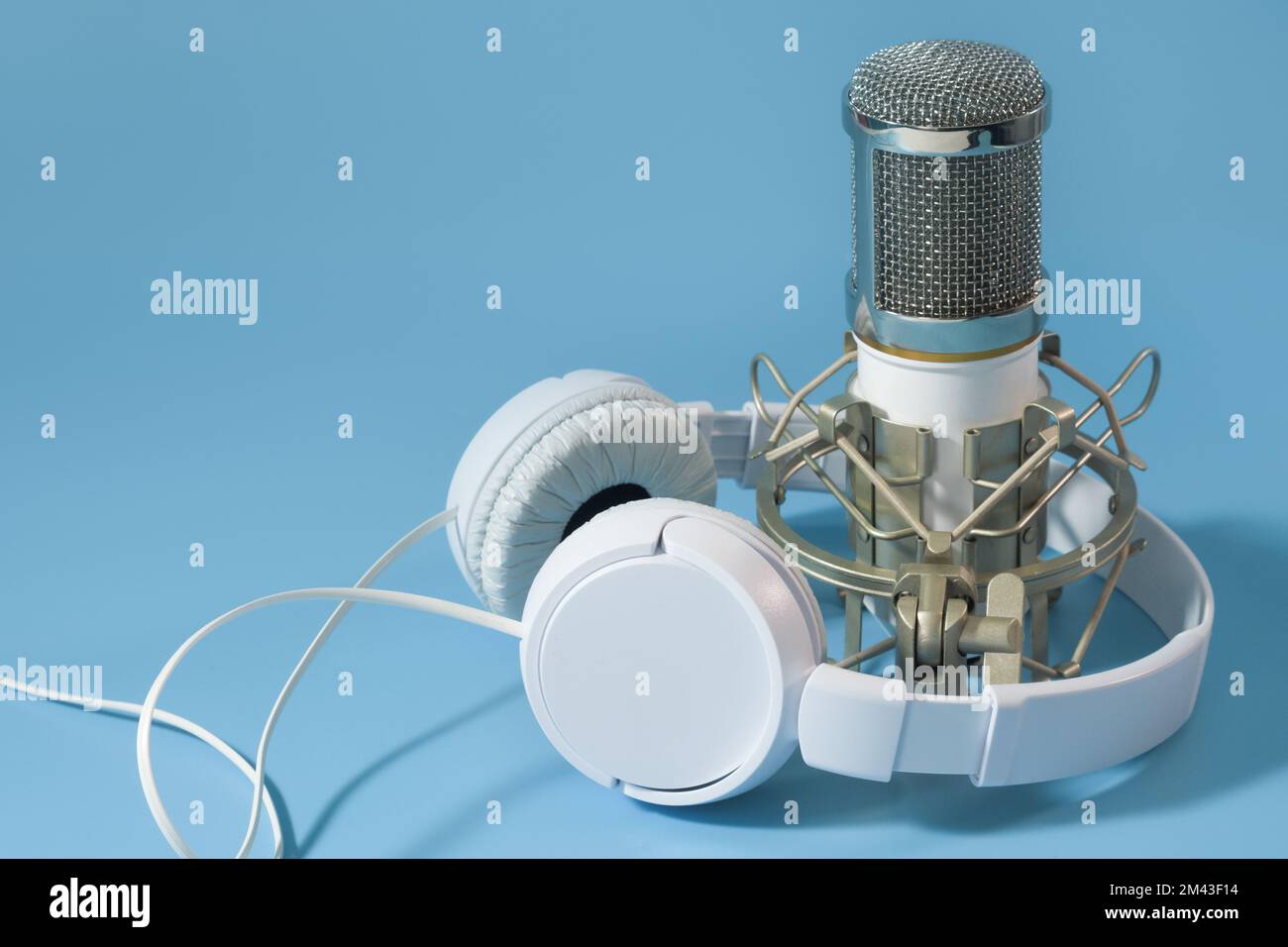 Headphones and microphone. Sound recording set of microphone and ...