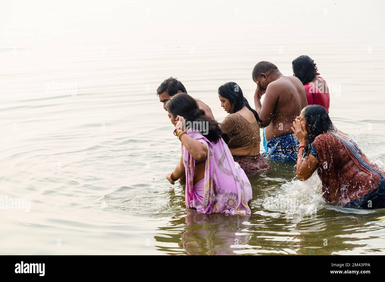Morning hours are busy with pilgrims at the ghats Stock Photo - Alamy