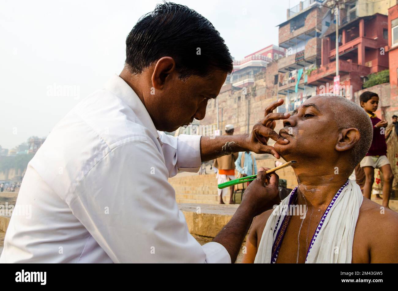 Shaving head and beard is part of the ritual to pray farewell for the ...