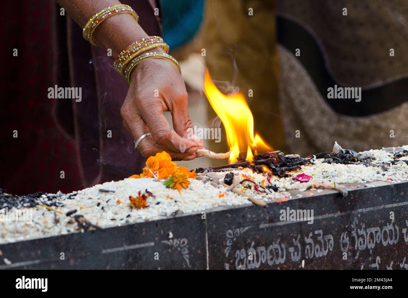 Performed pooja hi-res stock photography and images - Alamy