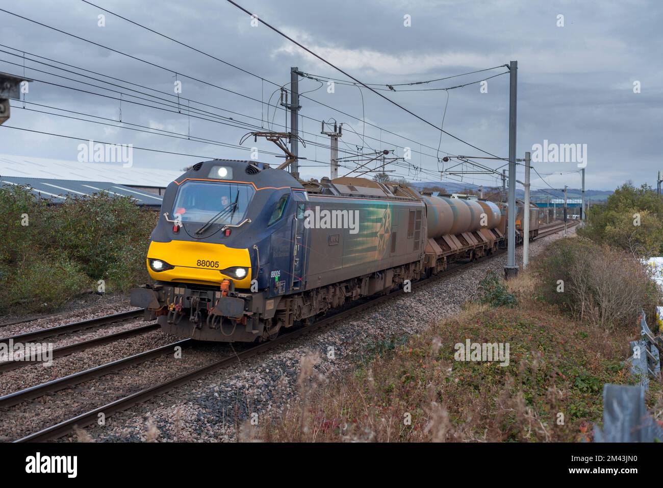 DRS class 88 locomotive 88005 hauling a Network Rail railhead treatment ...
