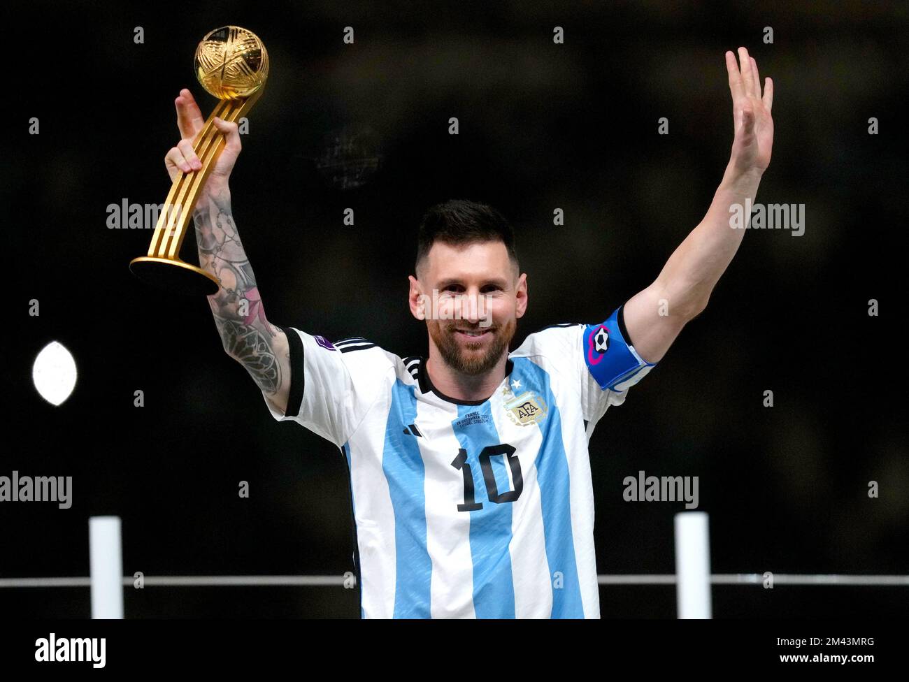 Argentina's Lionel Messi celebrates after being presented with the ...