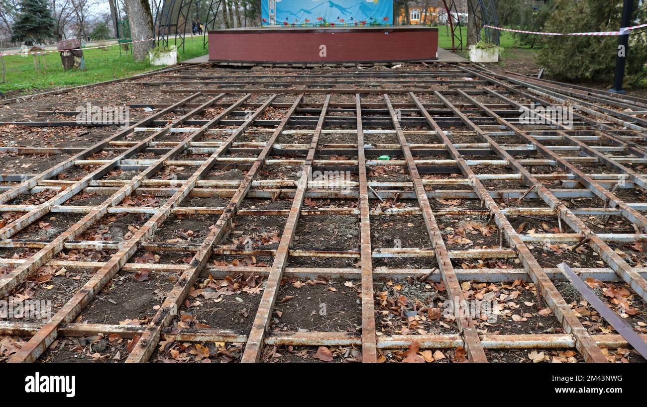 construction site with a structure of old iron beams covered with rust ...