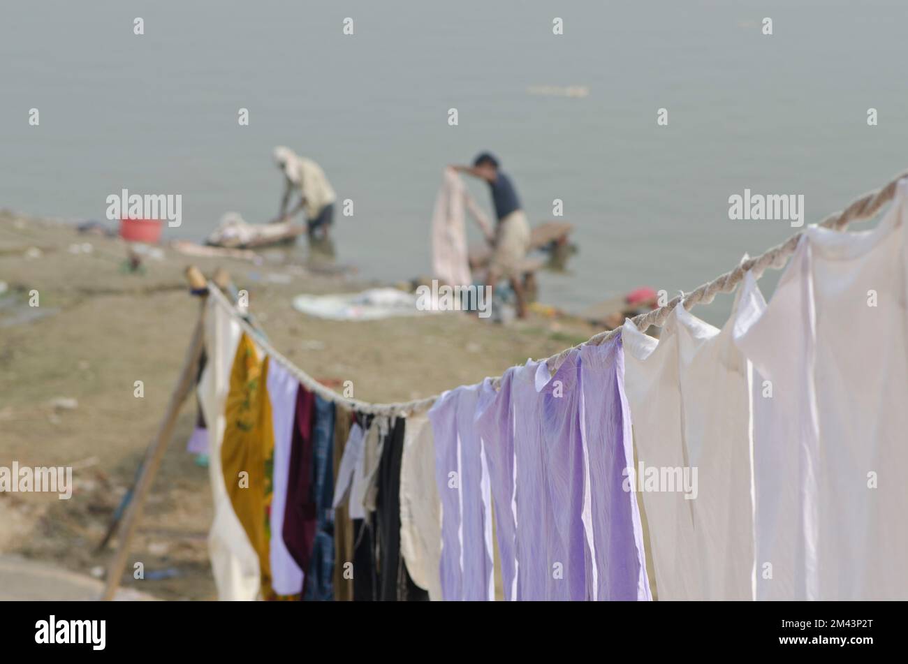 Dhobi-walas, people of the loundry cast in India, doing their work ...