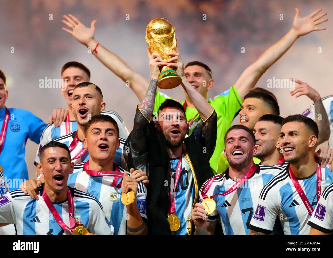 Argentina captain Lionel Messi lifts the FIFA World Cup trophy ...