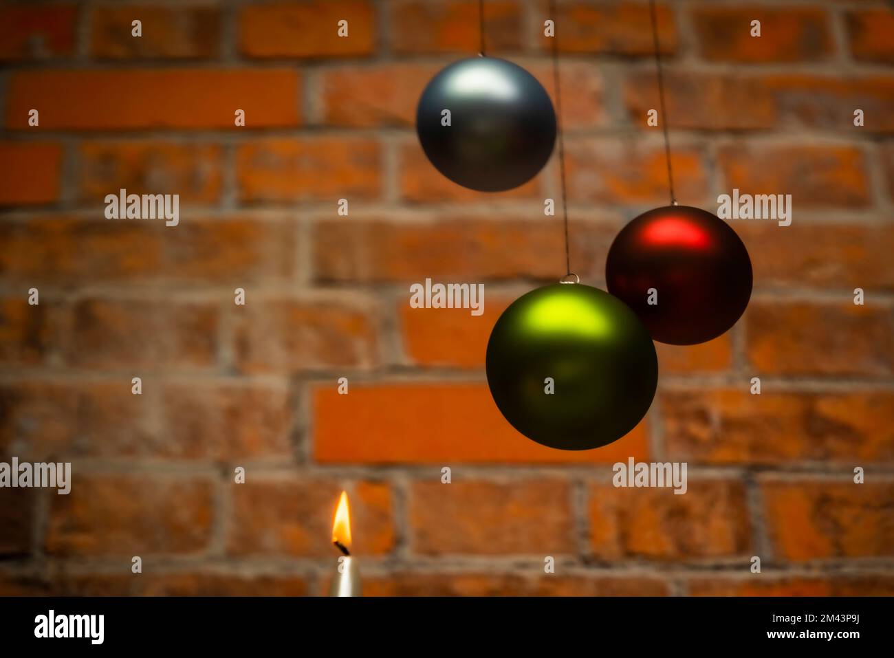 Color Christmas balls hanging interior with dark red background Stock ...