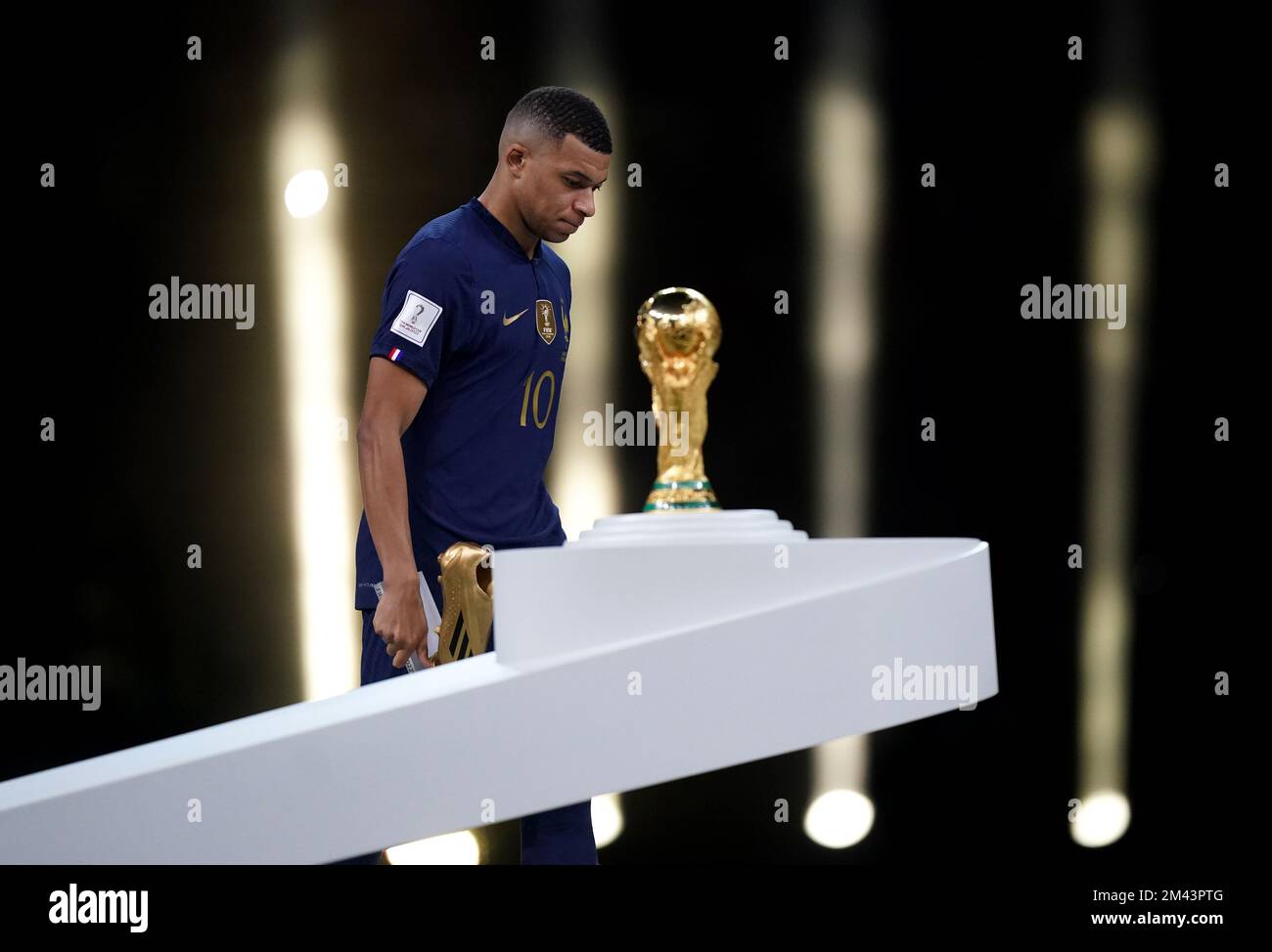 France's Kylian Mbappe looks dejected as he walks past the FIFA World ...