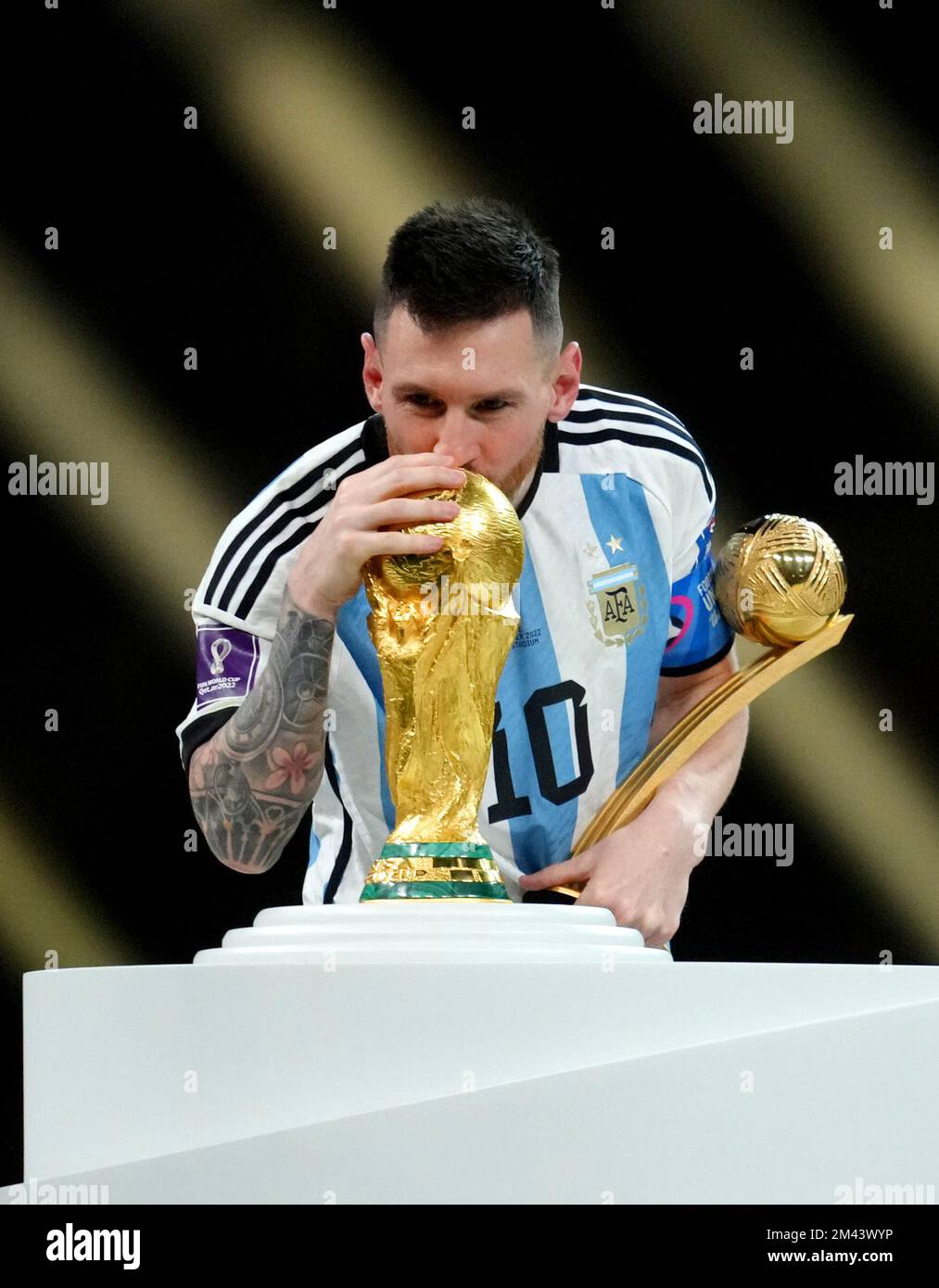 Argentinas Lionel Messi Kisses The Fifa World Cup Trophy After Being