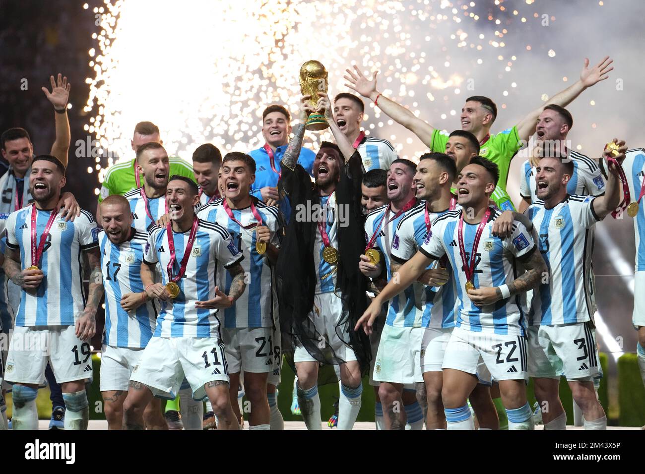 Argentina captain Lionel Messi lifts the FIFA World Cup trophy ...