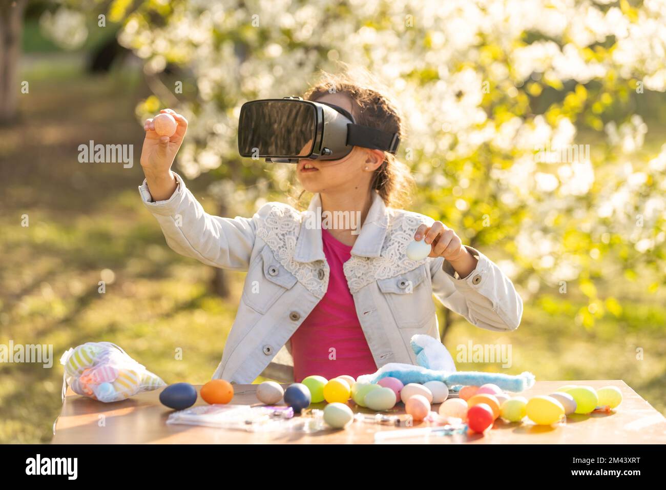 teenage girl with easter egg in virtual glasses Stock Photo - Alamy