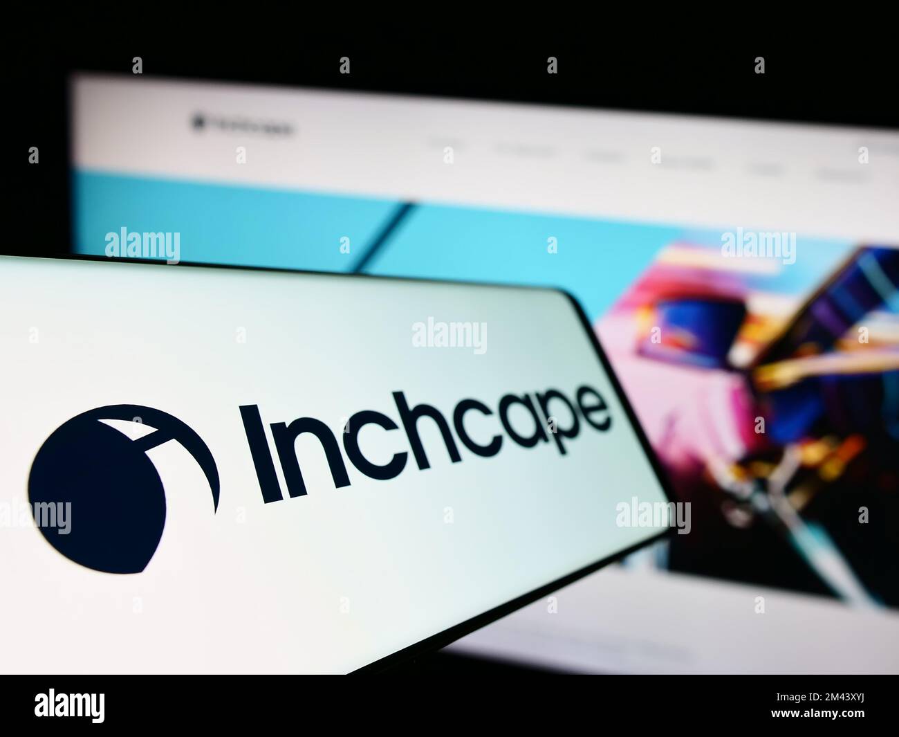 Mobile phone with logo of British car dealing company Inchcape plc on ...
