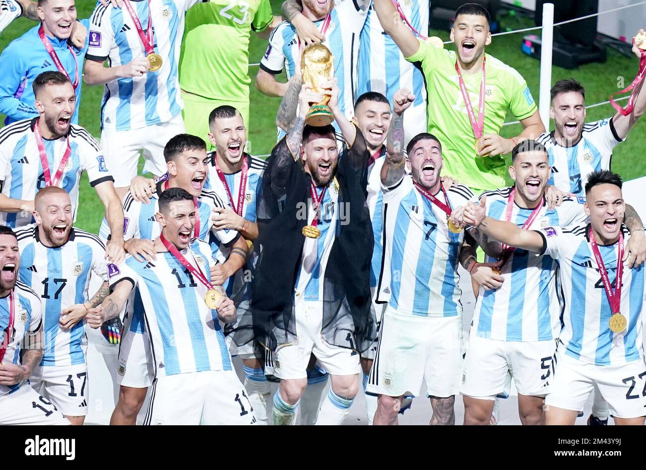Argentina captain Lionel Messi lifts the FIFA World Cup trophy ...