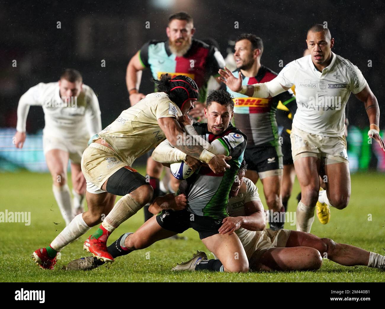 Harlequins' Nick David tackled by Racing 92's Donovan Taofifenua during ...