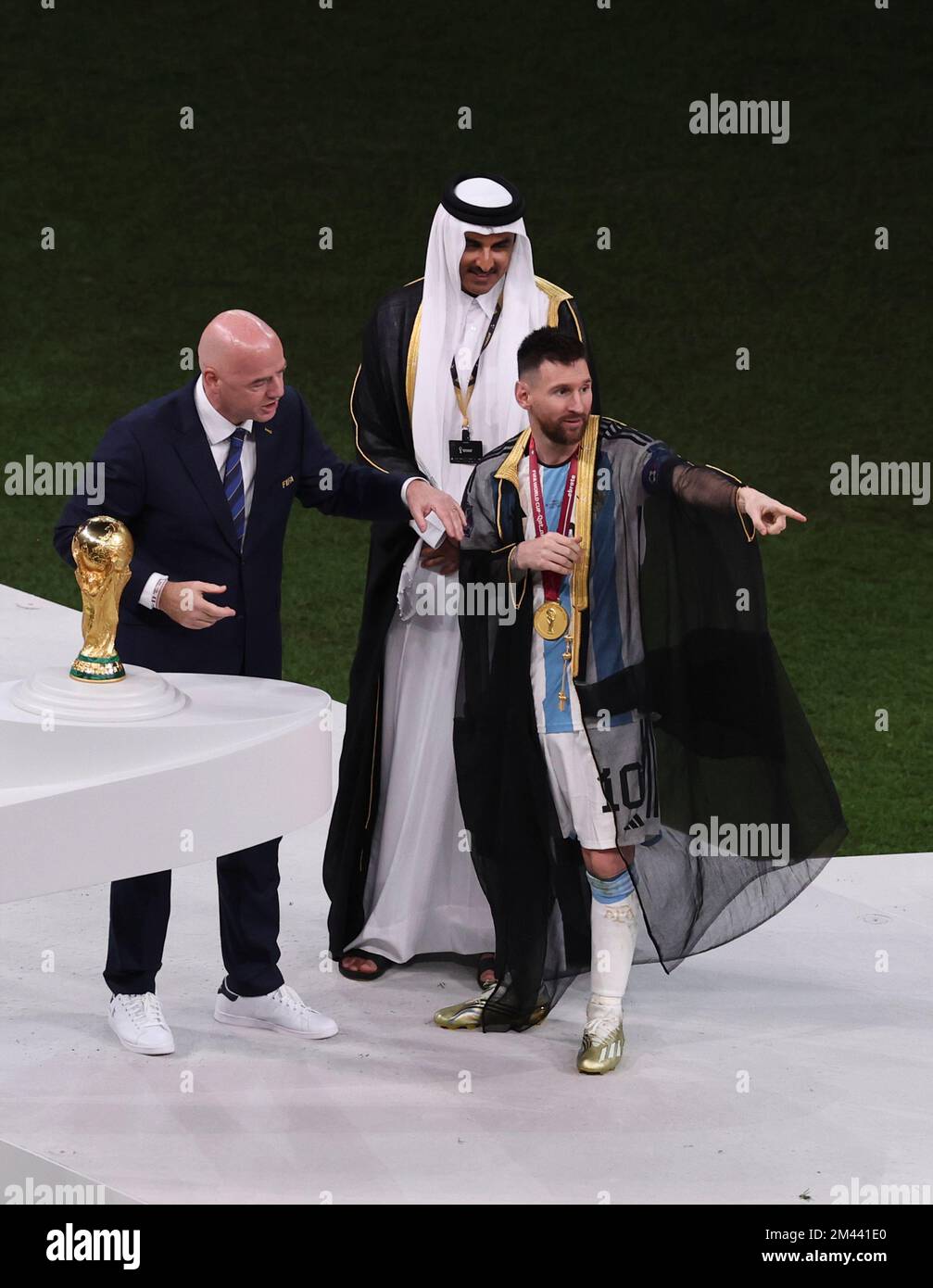 Lusaier, Qatar. 18th Dec, 2022. Lionel Messi (R) of Argentina is ...