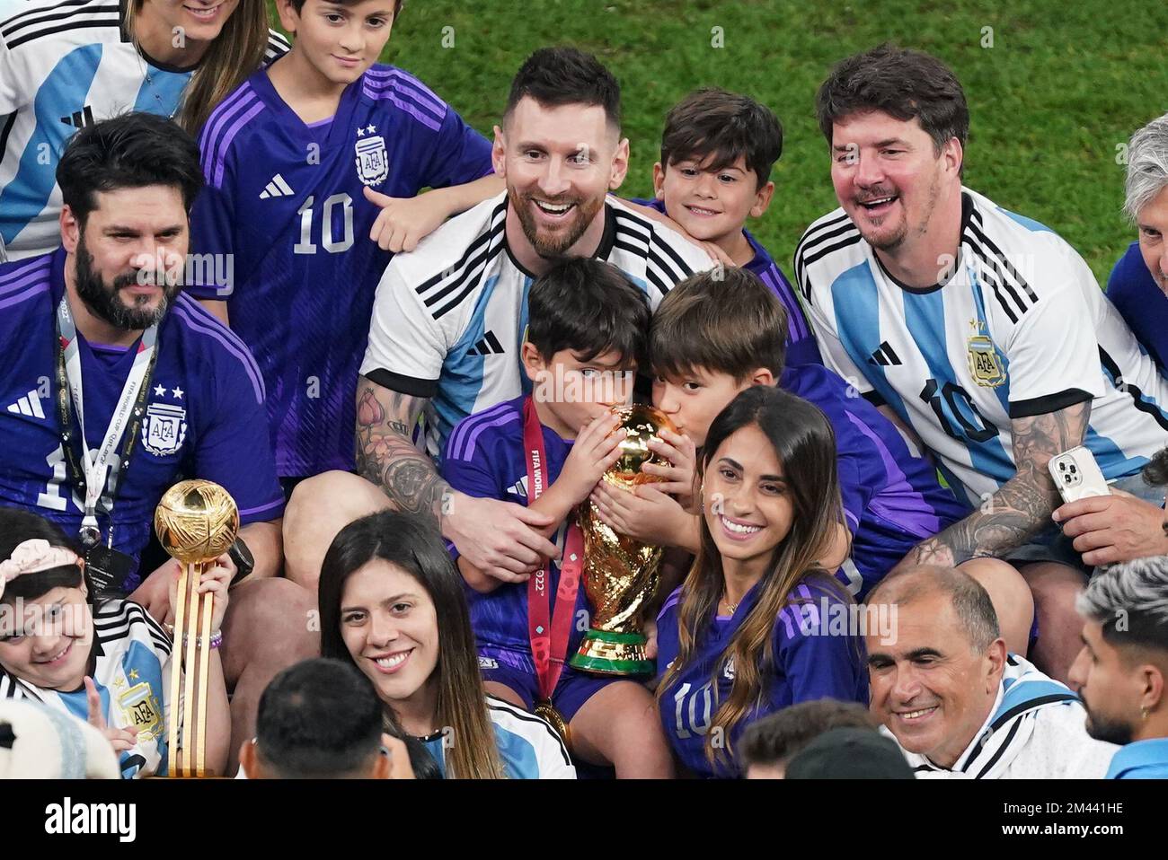 Argentina's Lionel Messi sits with family members after the FIFA World ...