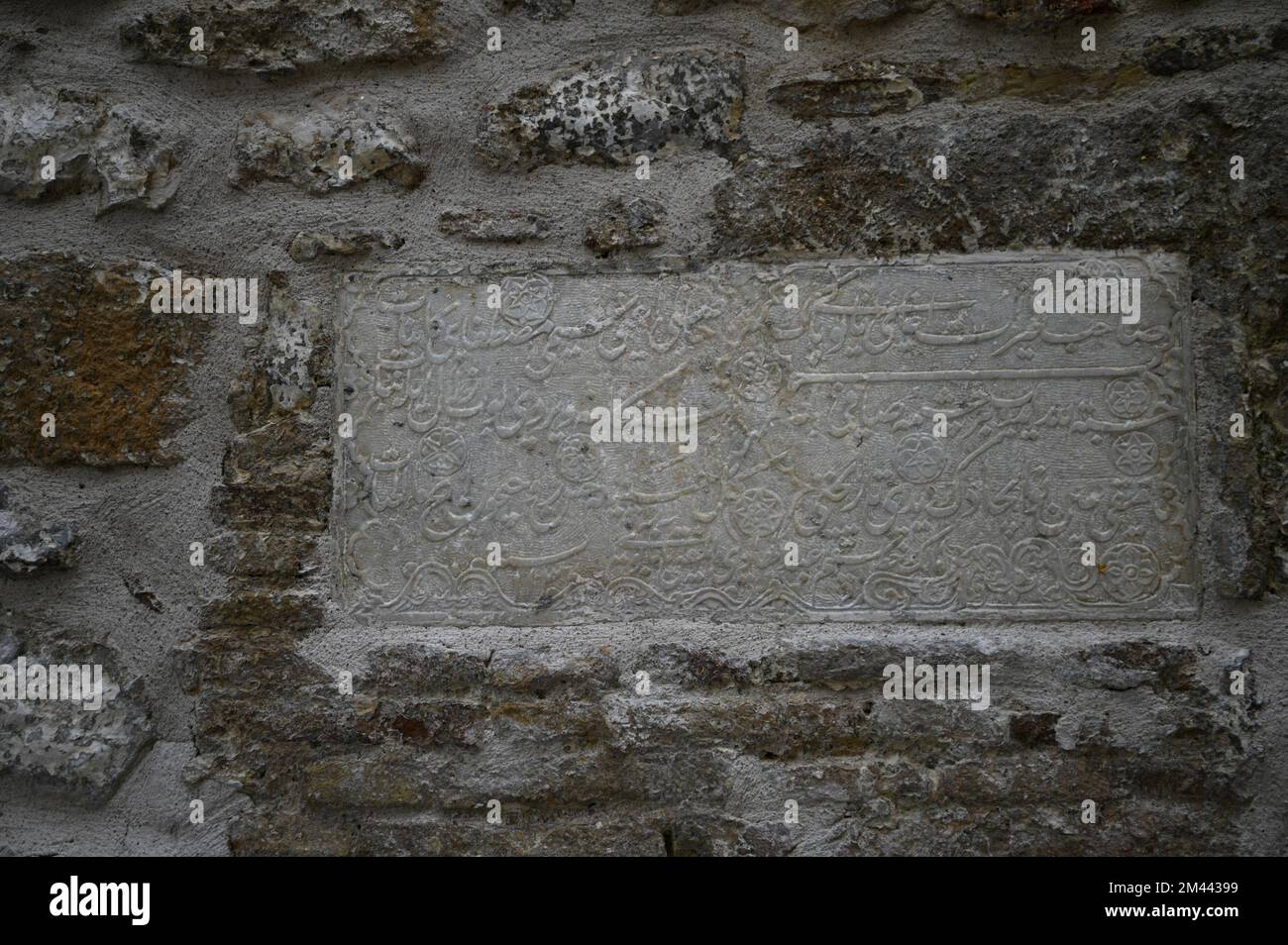 Ancient historic inscription on a stone wall in Nafplio, Greece Stock ...