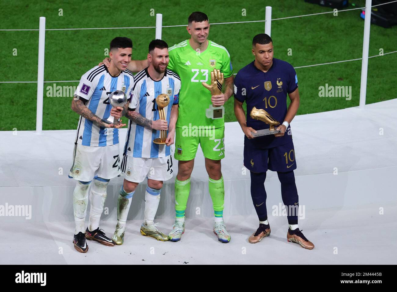 Lusail, Qatar. 18th Dec, 2022. Award winners Enzo Fernandez of Argentina, Lionel Messi of ...