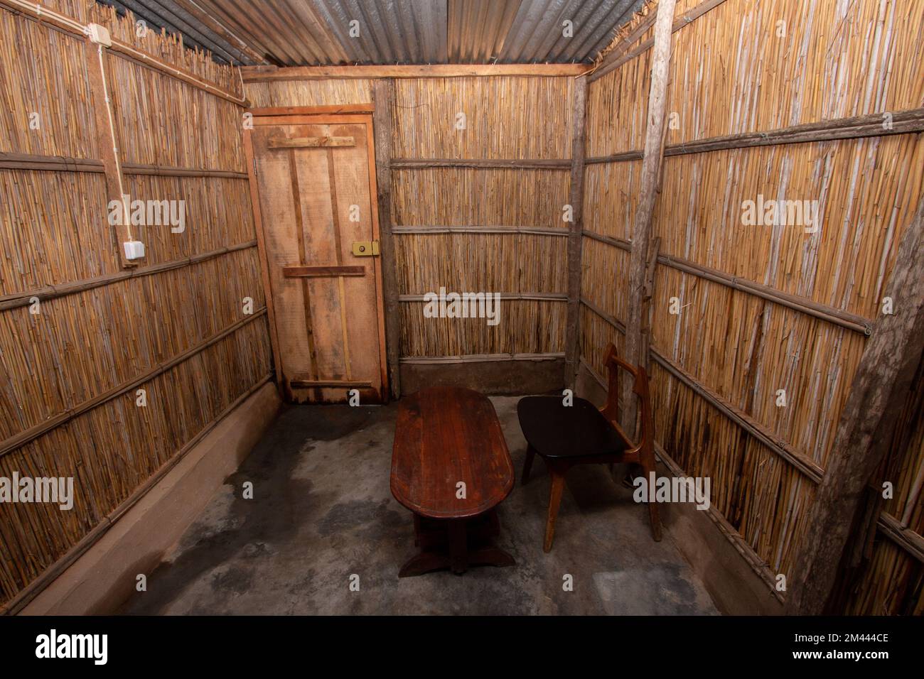 Interior view of a reed house, common in some parts of Africa, with a ...