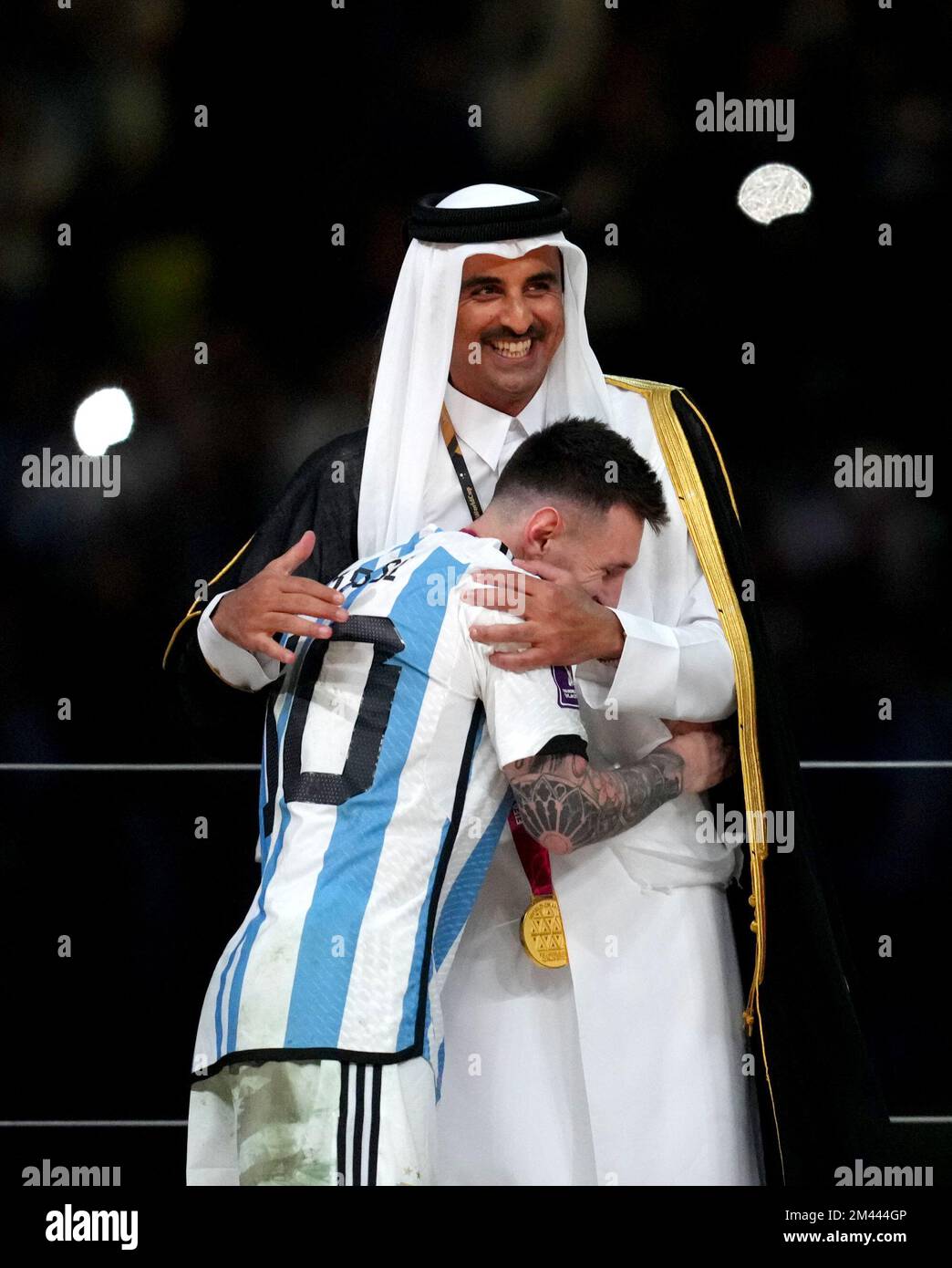 Argentina captain Lionel Messi hugs The Emir of Qatar, Sheikh Tamim bin ...