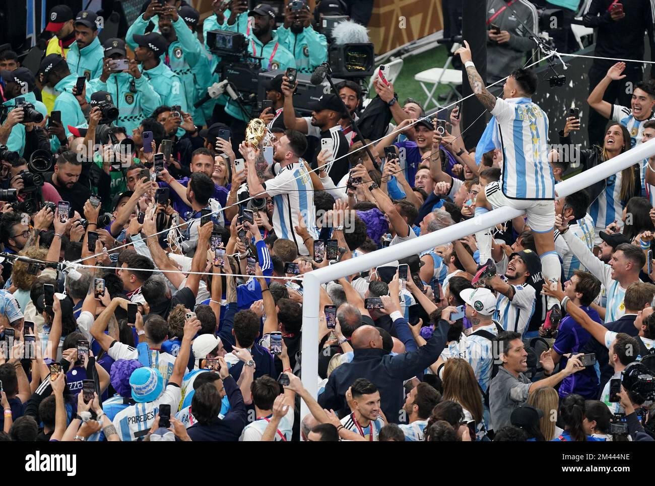 Argentina captain Lionel Messi lifts the FIFA World Cup trophy ...