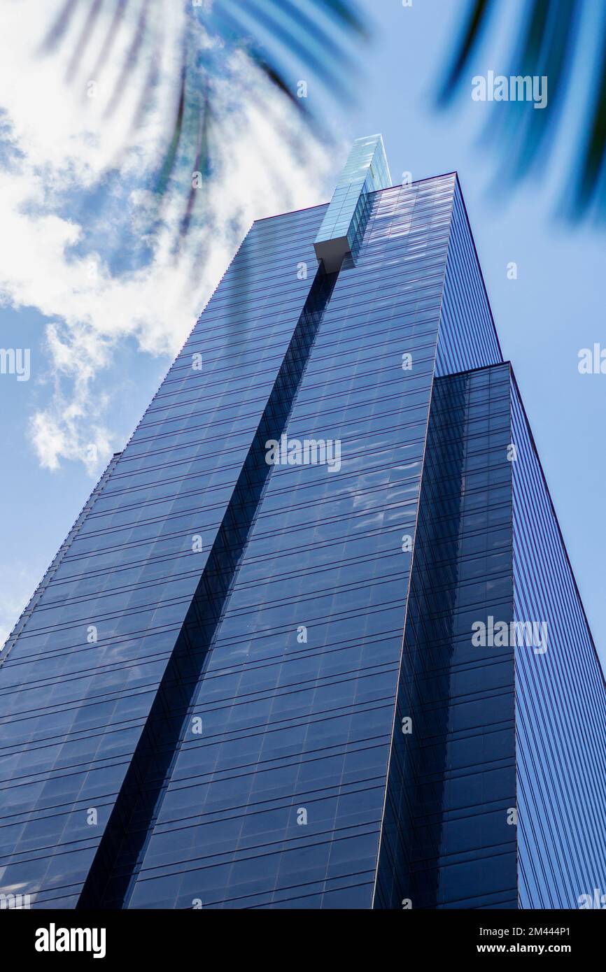high rise building with dark glass windows, blue sky Stock Photo - Alamy
