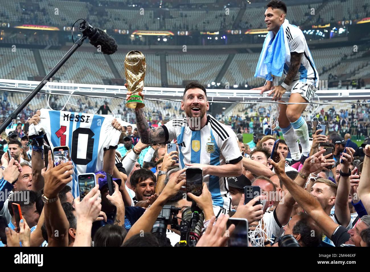 Argentina captain Lionel Messi celebrate with the FIFA World Cup Trophy ...