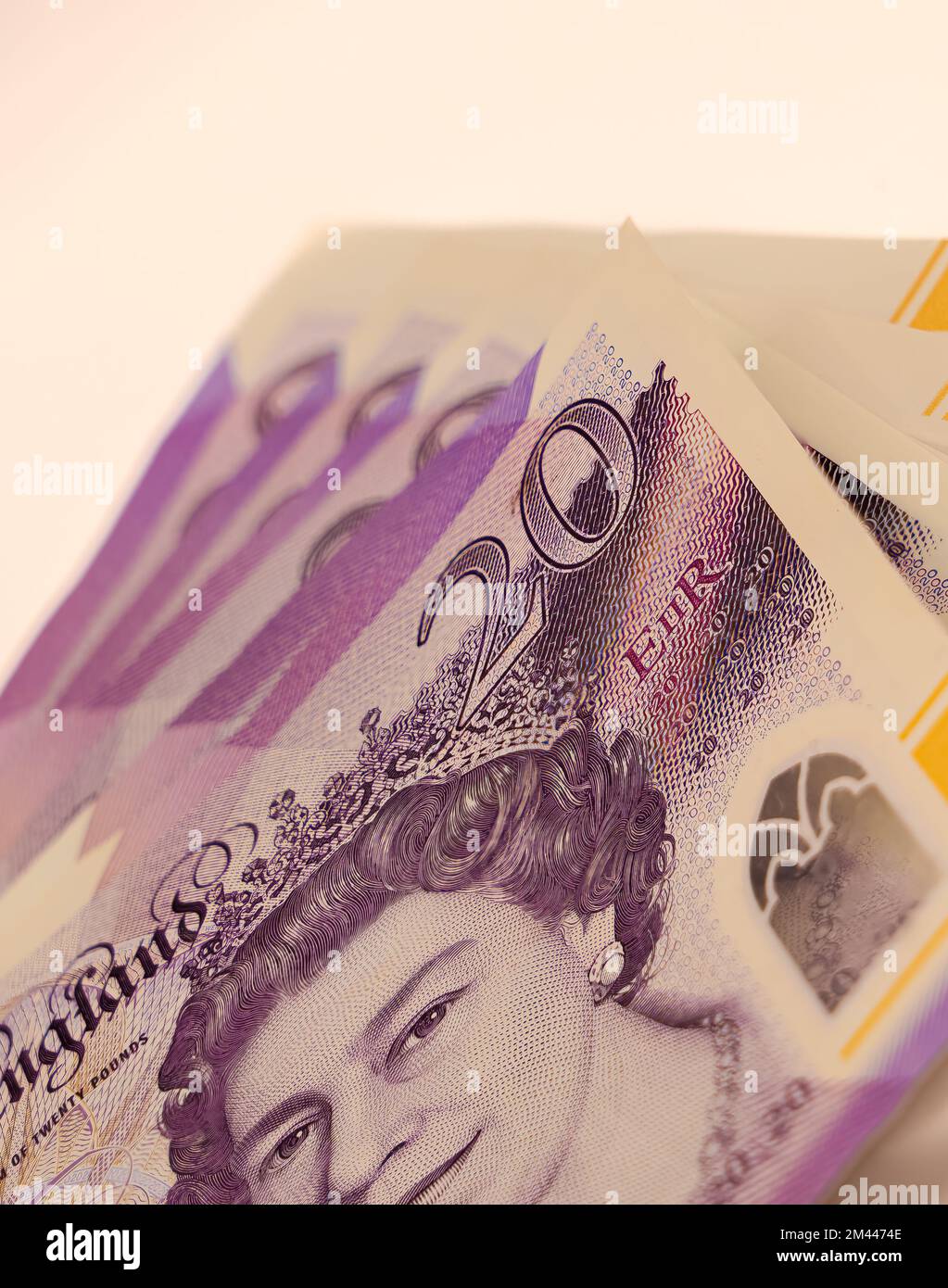 a detailed close-up of new fanned plastic GBP £ Sterling 20 Twenty ...